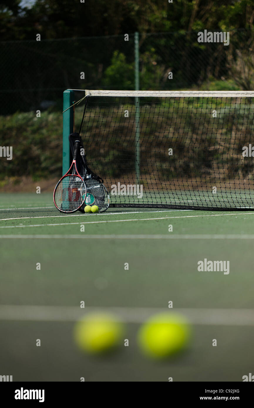 Tennis courts with rackets and balls, Cornwall Stock Photo - Alamy