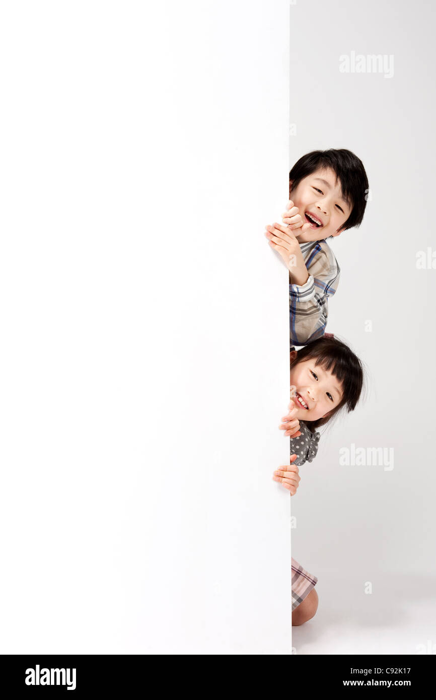 Child Peeking Around Corner