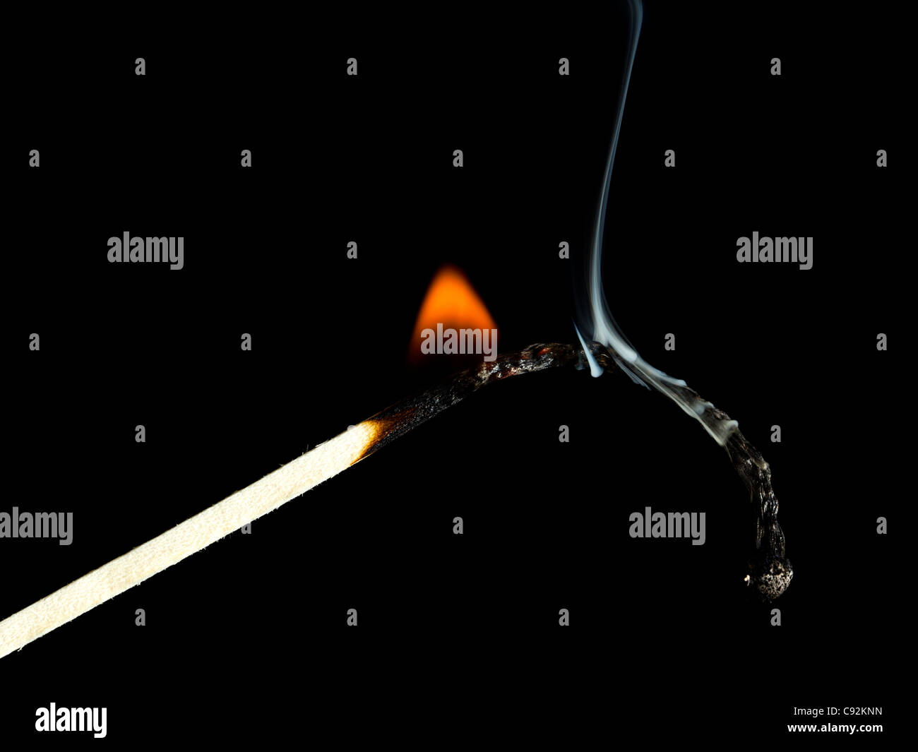 close-up of extinguishing match, black background Stock Photo - Alamy