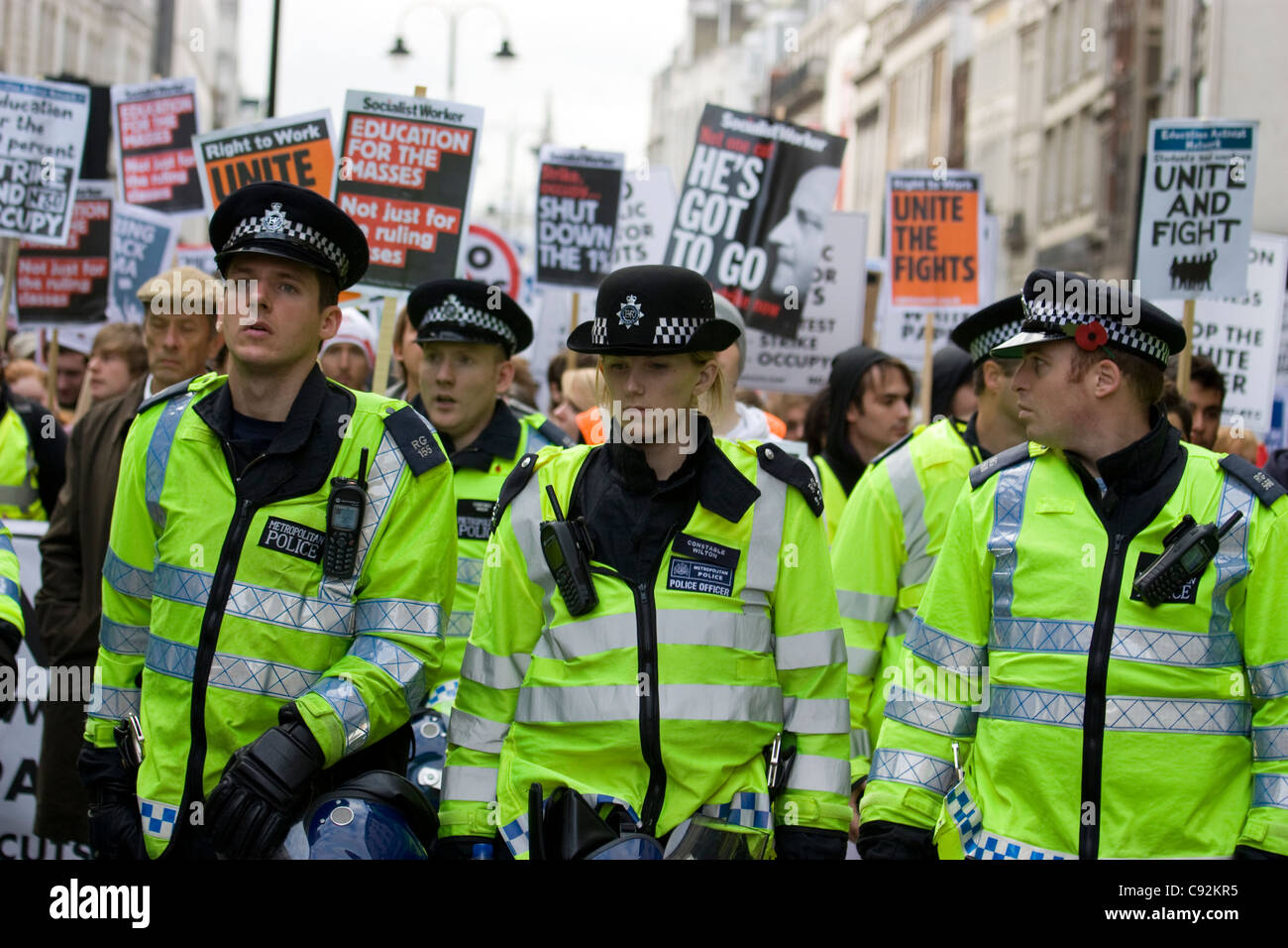 students protest in central London UK, about cuts to public spending ...
