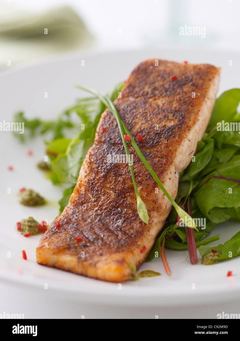 spicy coated Salmon steak Stock Photo - Alamy