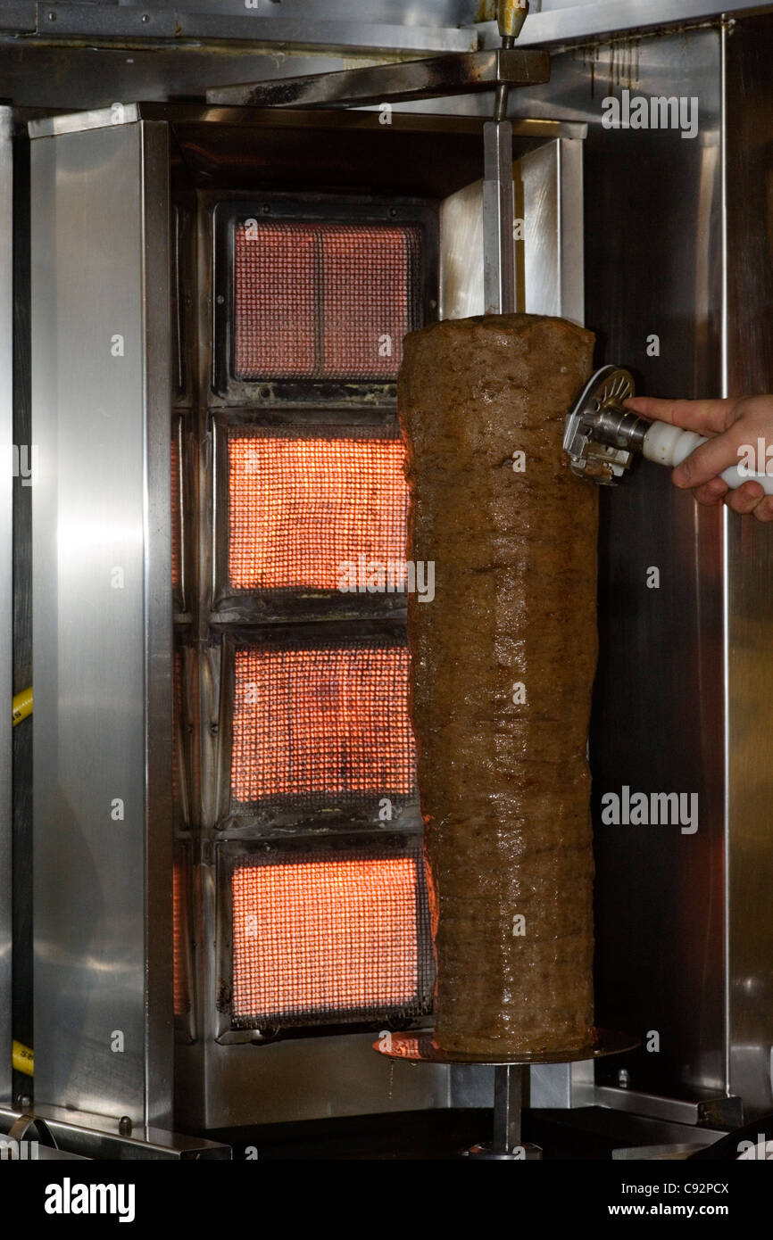 man working in kebab shop preparing kebabs Stock Photo - Alamy