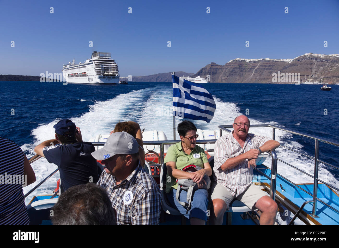 Santorini - passengers from cruise ship MSC Armonia disembark via a ...