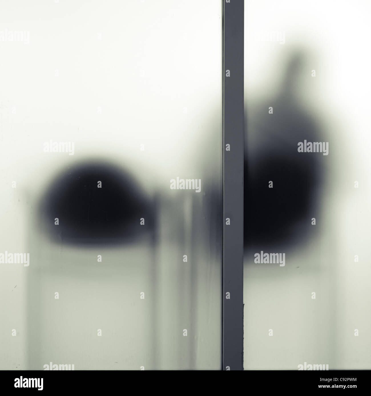 Distorted blurred silhouette of person waiting for flight at airport ...