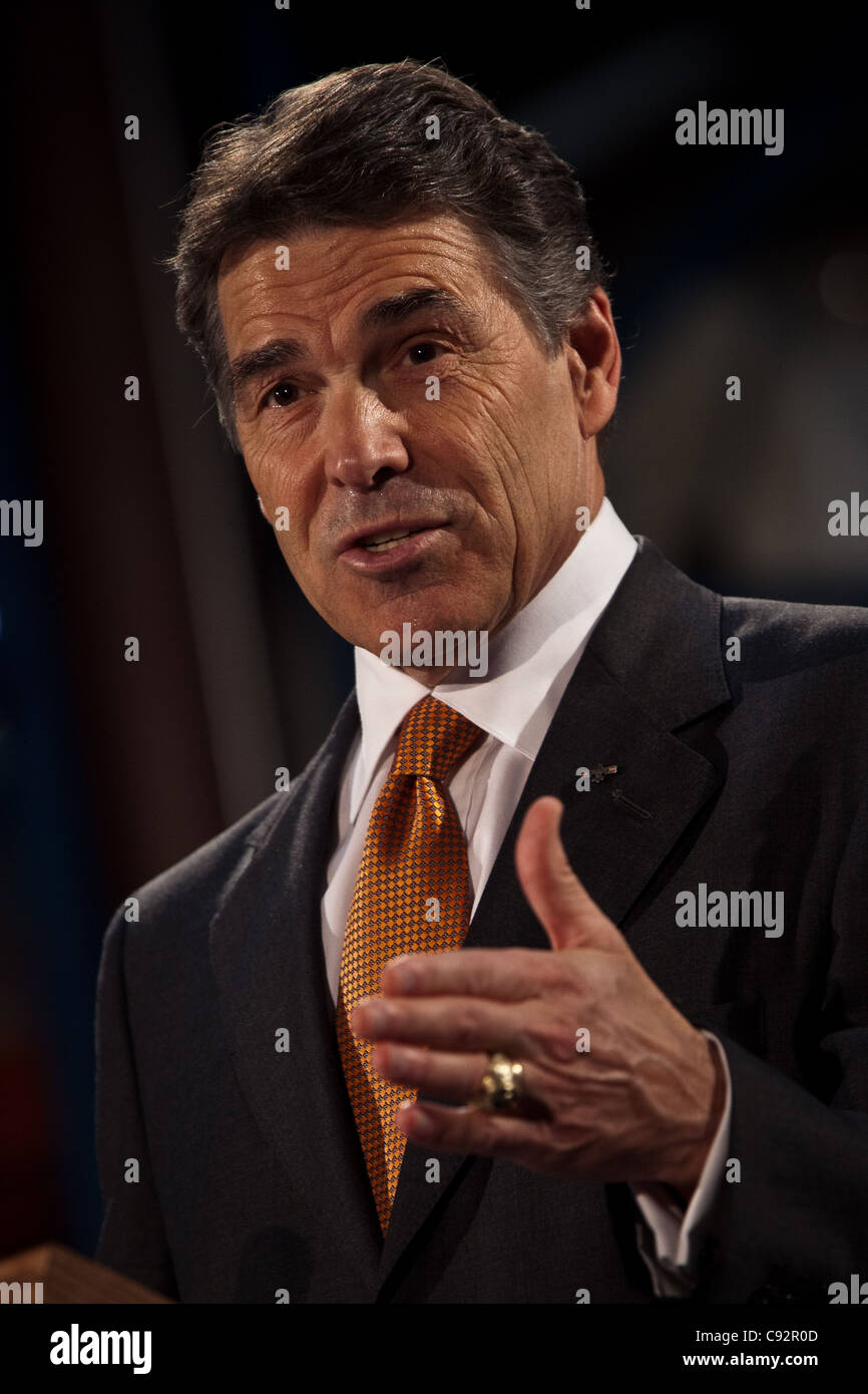 Republican presidential candidate Gov. Rick Perry outlines his flat tax ...