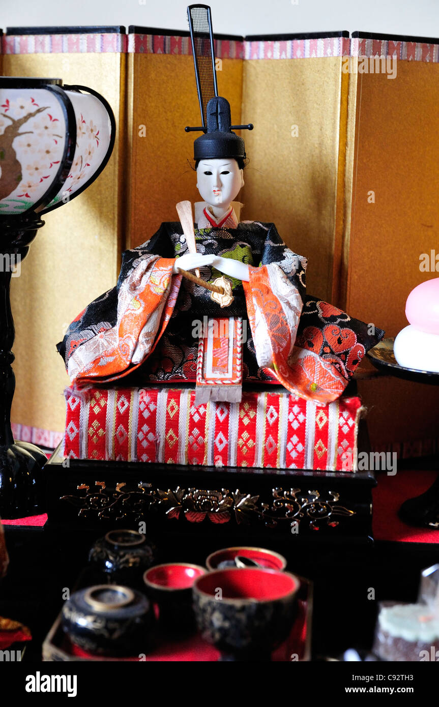 This display of an ornamental doll of a King is for the Hinamatsuri ...