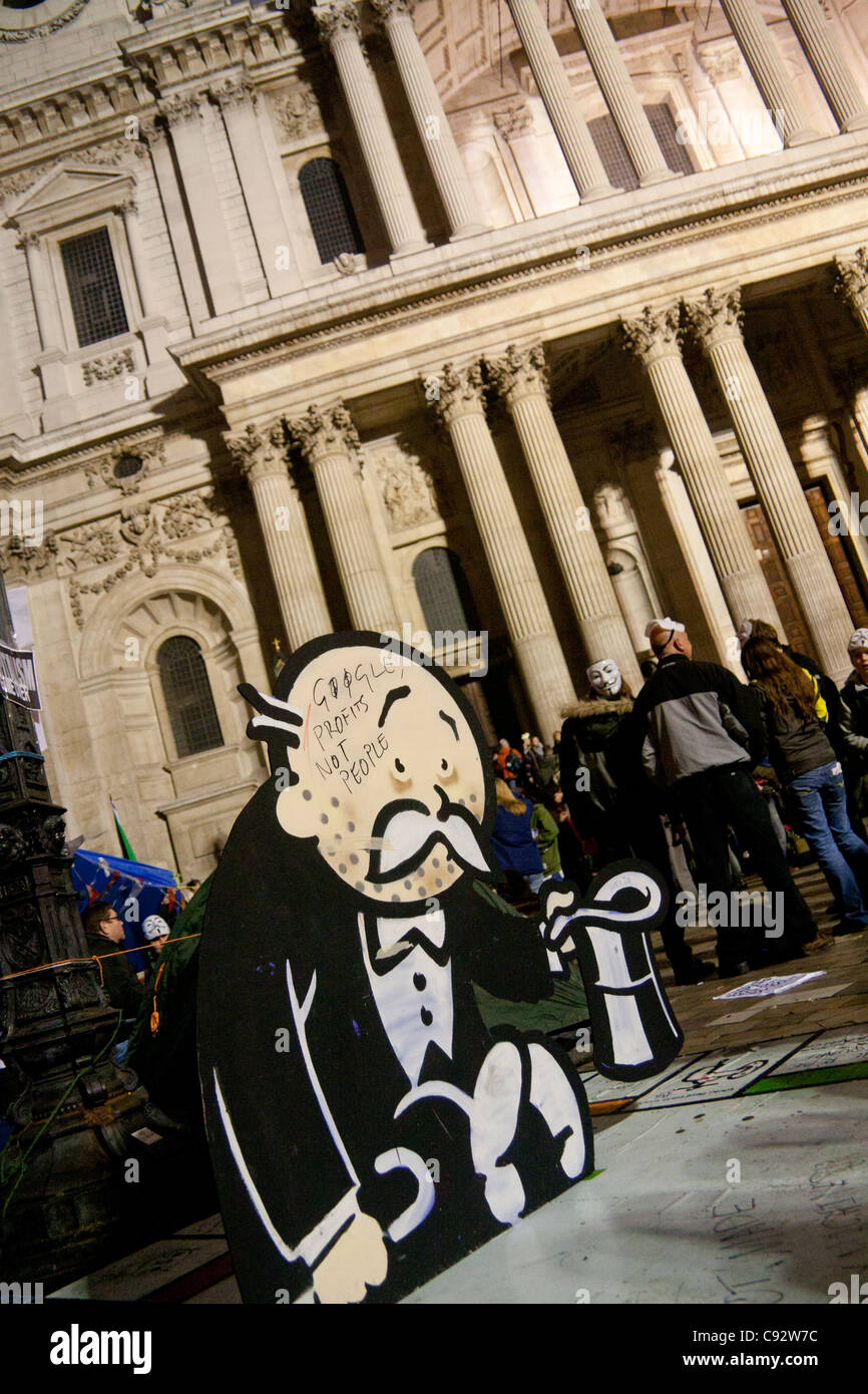 Occupy London protest outside St Paul's Cathedral butler figure holding ...
