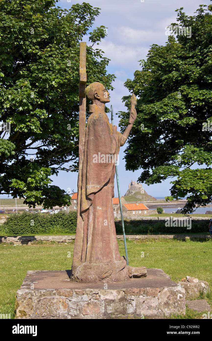 The statue of St Aidan founder of a monastery stands on the Holy Island ...