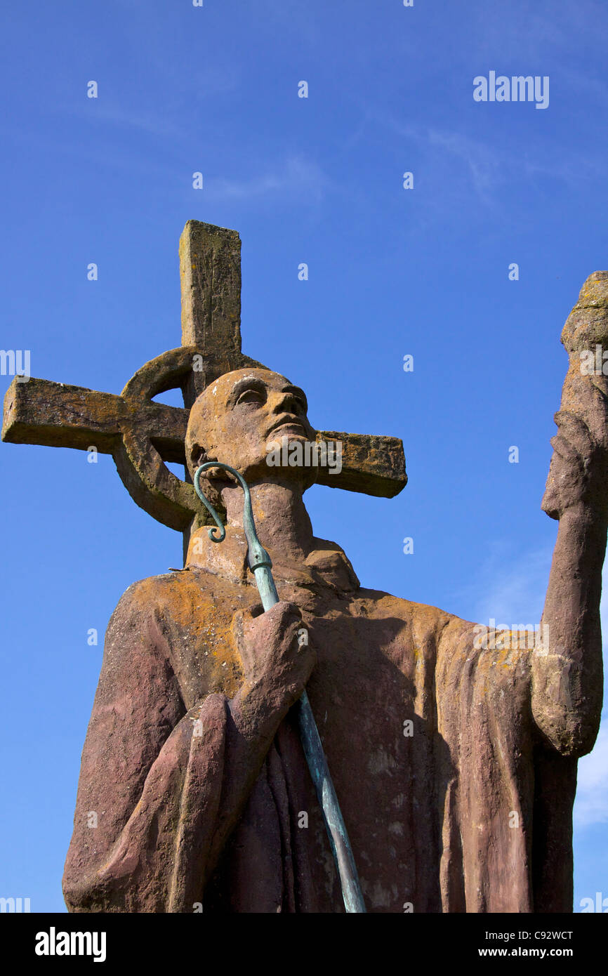 The statue of St Aidan founder of a monastery stands on the Holy Island ...