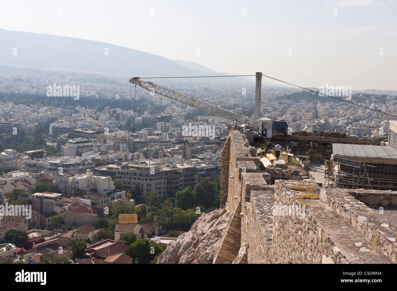 Athens - crane lifting masonry blocks on to the Acropolis hill for ...
