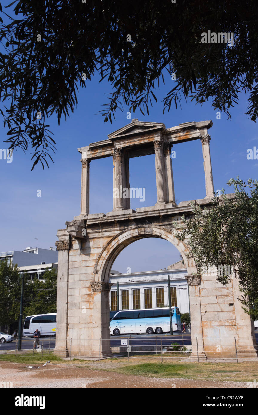 Athens - looking through Hadrian's Gate or Arch, coach tour buses ...