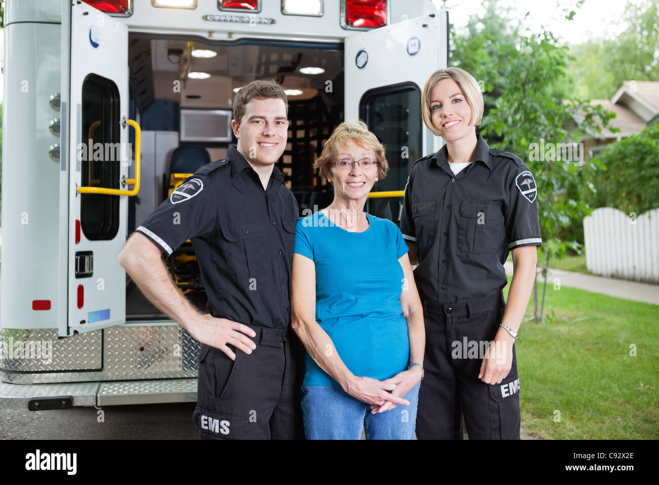 Portrait of two ambulance with patient Stock Photo - Alamy