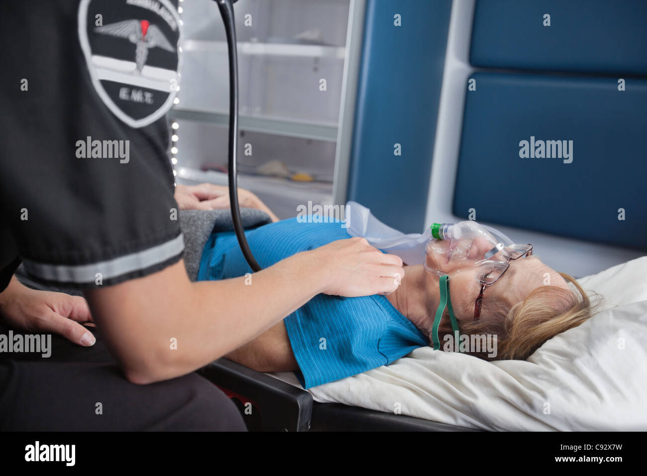 Emt worker listening hi-res stock photography and images - Alamy