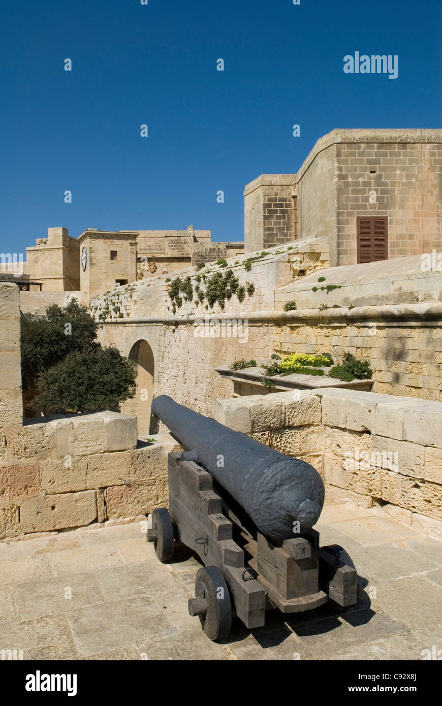 The historic fortified citadel walls of Victoria in Gozo are defended ...