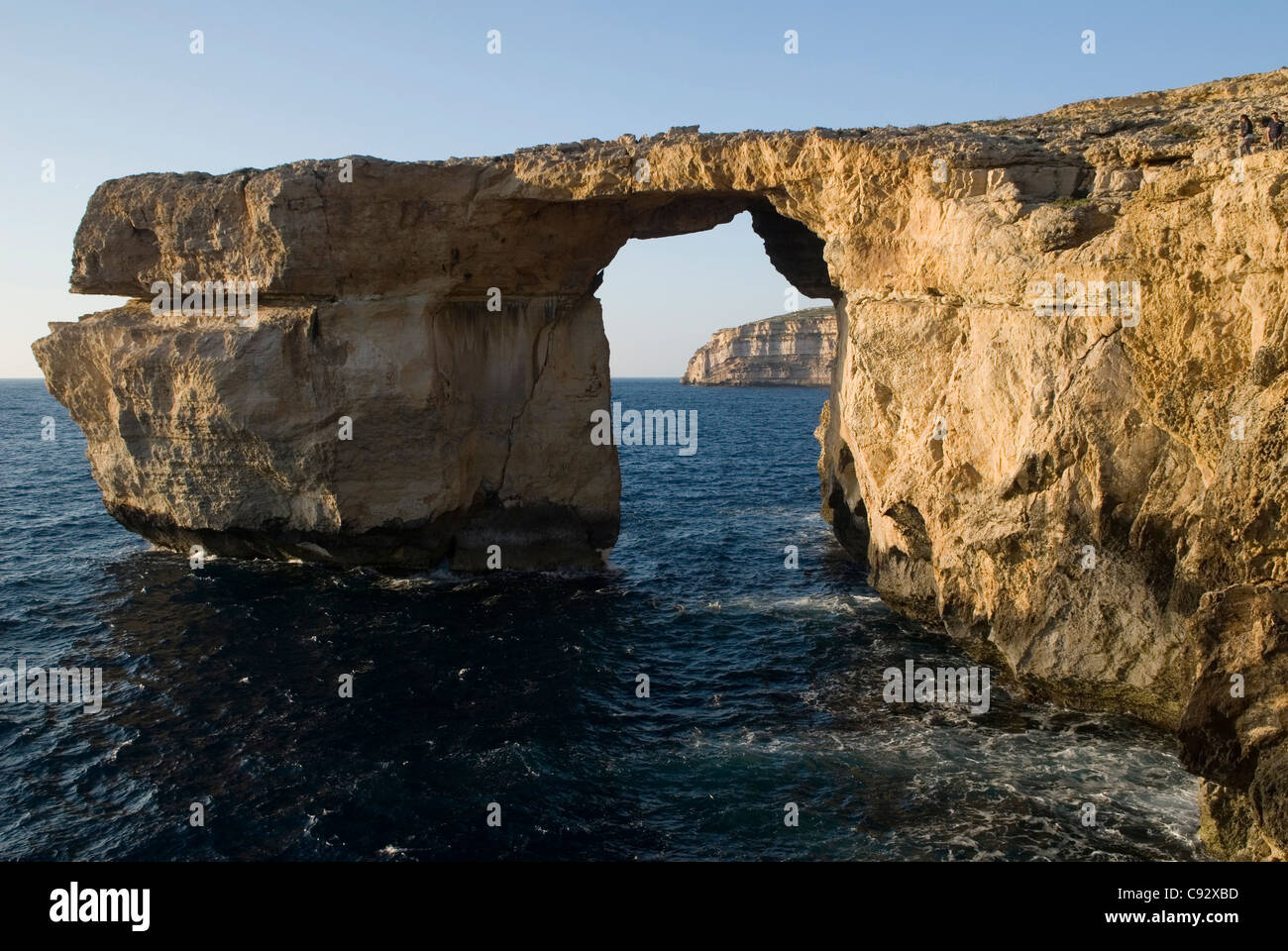 The Azure window is a natural rock arch on the Island of Gozo Stock ...