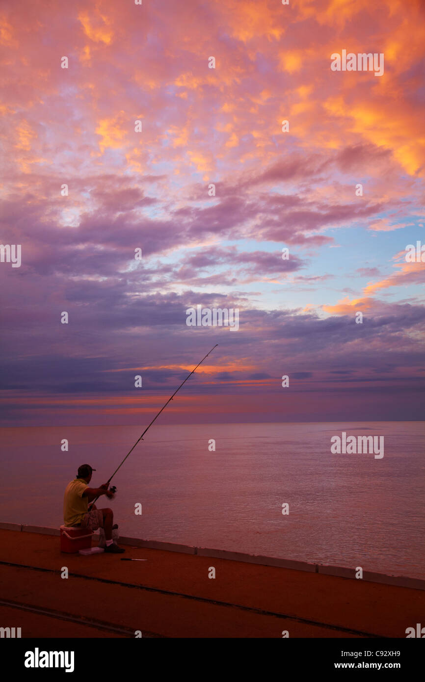 Fishing off Derby Wharf at sunset, Derby, Kimberley Region, Western ...