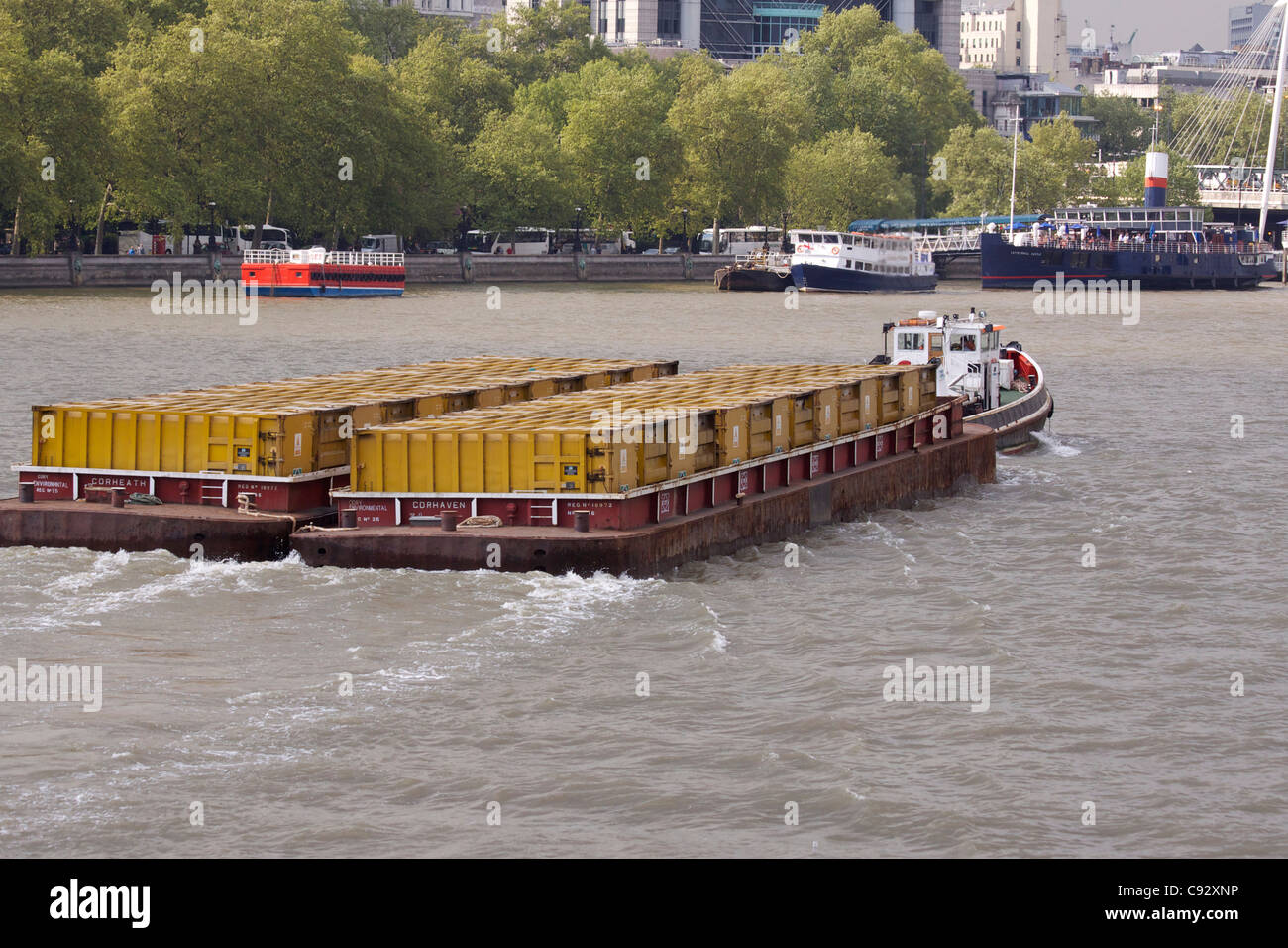 One of the Thames tugs used to pull yellow containers of waste (managed ...