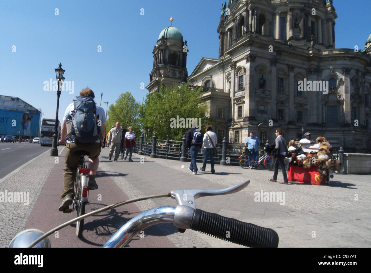 Cycling past Berliner Dom cathedral in Berlin Stock Photo - Alamy
