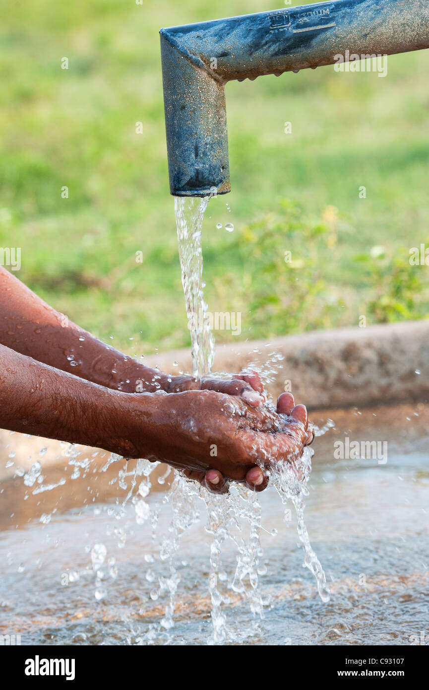 Washing at a water pump hi-res stock photography and images - Alamy