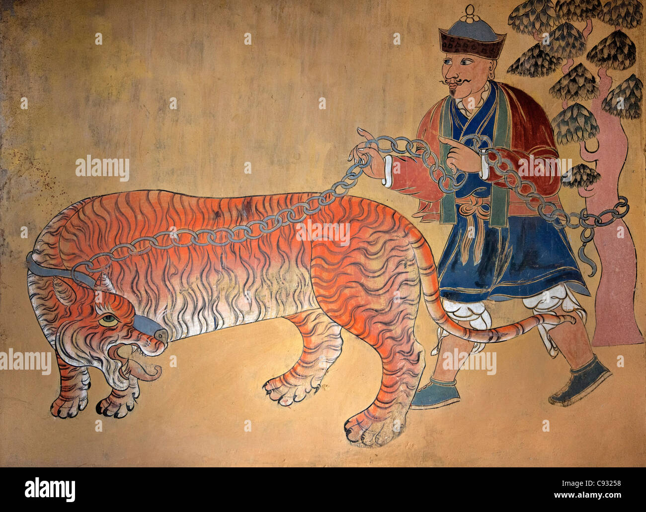 An old wall mural at Trongsa Dzong depicting a Mongol with a tiger ...