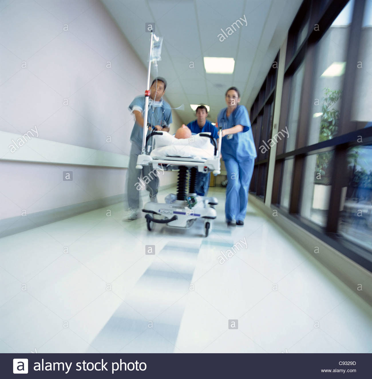 Doctors Patient Gurney Stock Photos & Doctors Patient Gurney Stock ...