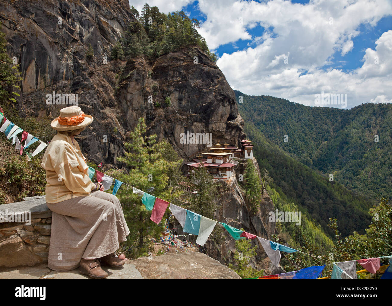 A visitor admires Taktshang Goemba, Tigers Nest, Bhutans most famous ...