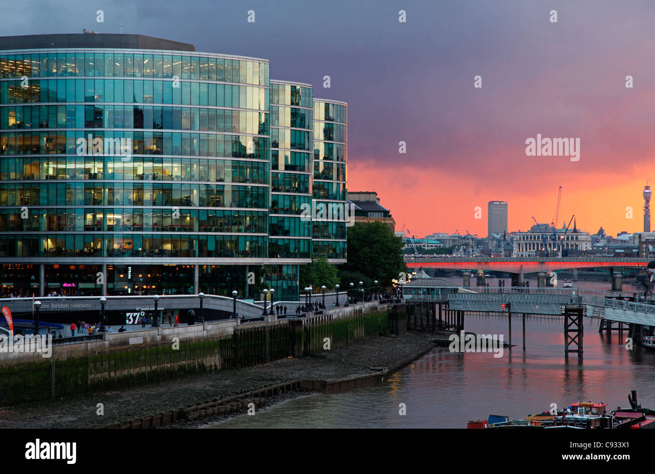 The River Thames in London seen from Tower Bridge with the modern ...