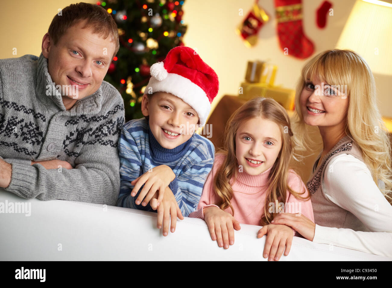 Portrait four happy family members hi-res stock photography and images ...