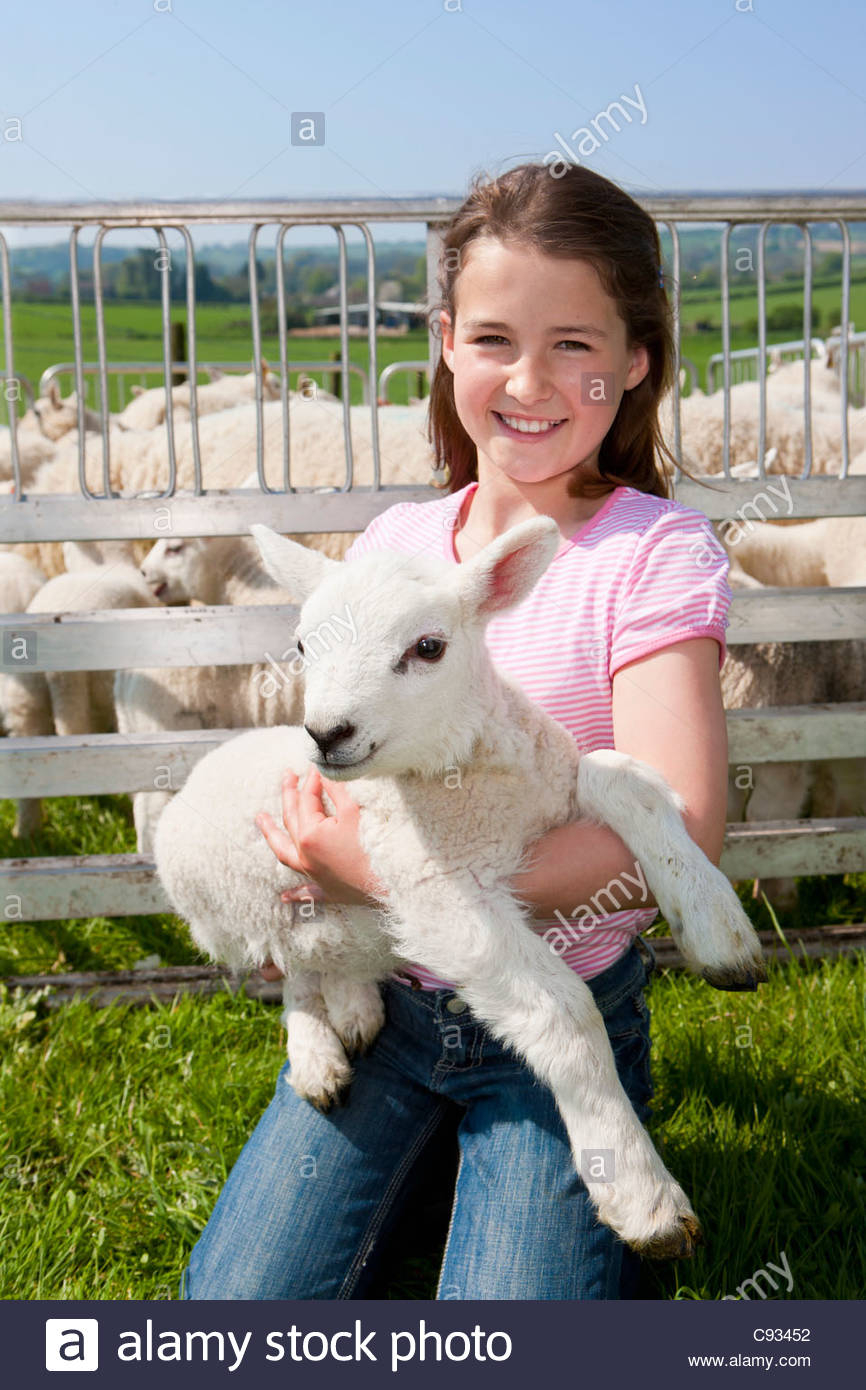 Girl Holding Lamb Stock Photos & Girl Holding Lamb Stock Images - Alamy