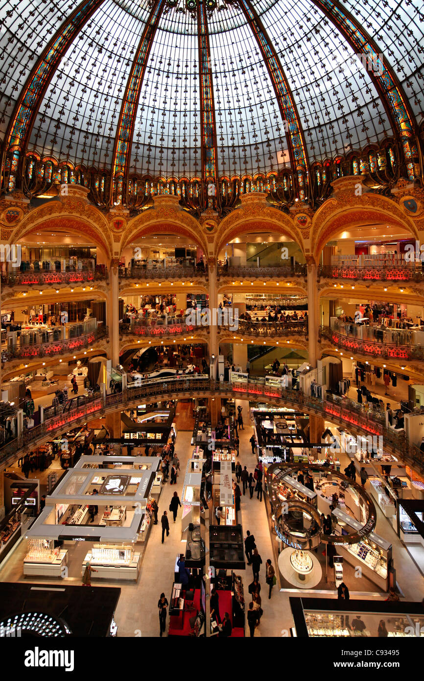 The round atrium in the famous Galeries Lafayette Department Store in ...