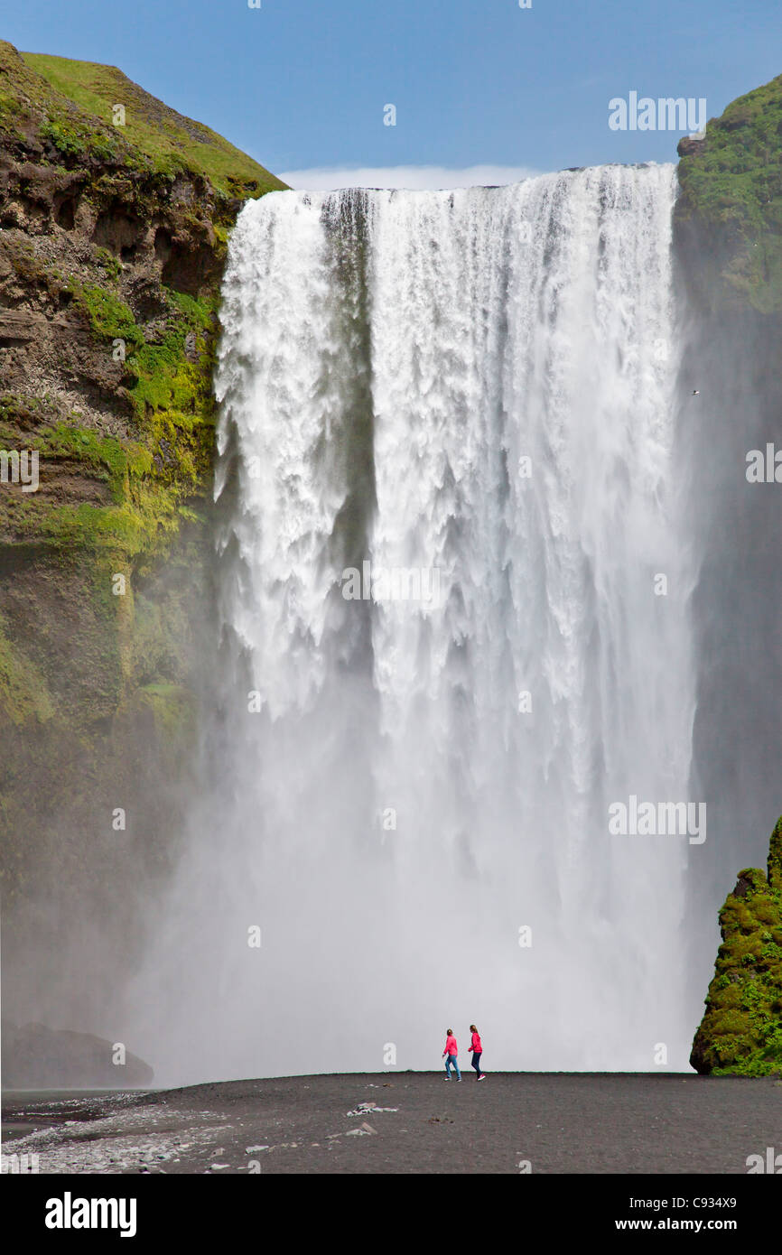 The 62-metres-high waterfall of Skogafoss is a dramatic sight on the ...