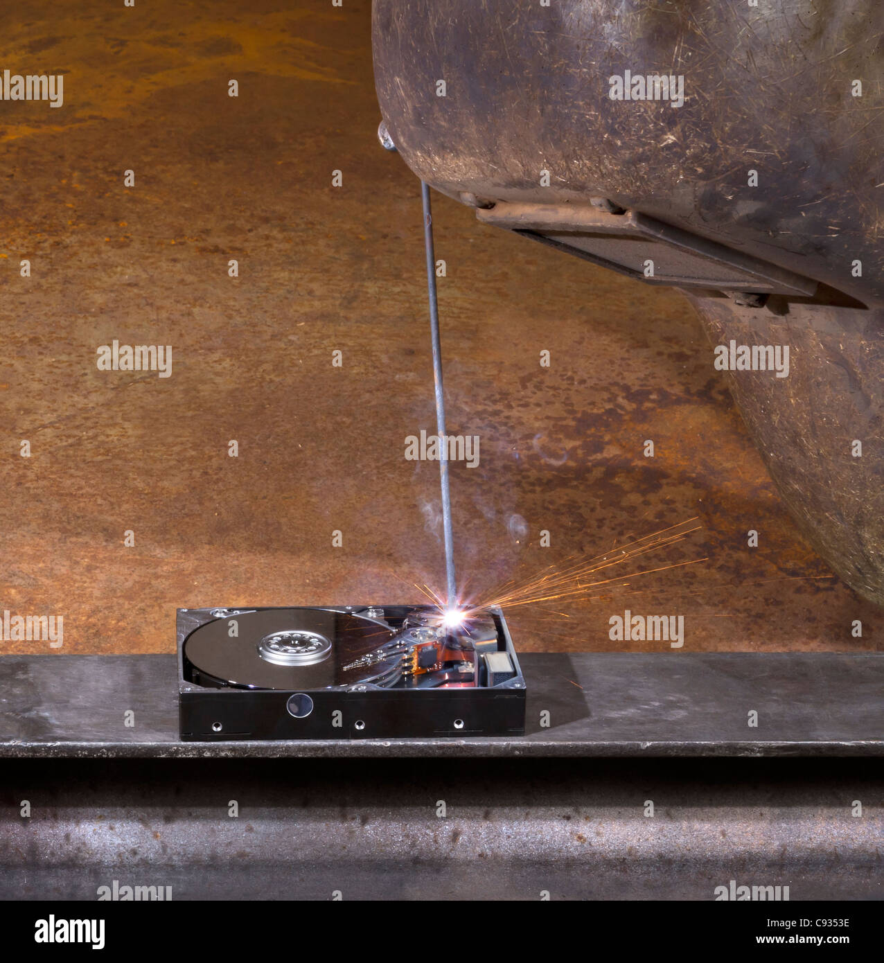 welding scenery with hard disk drive, welding mask detail and flying ...