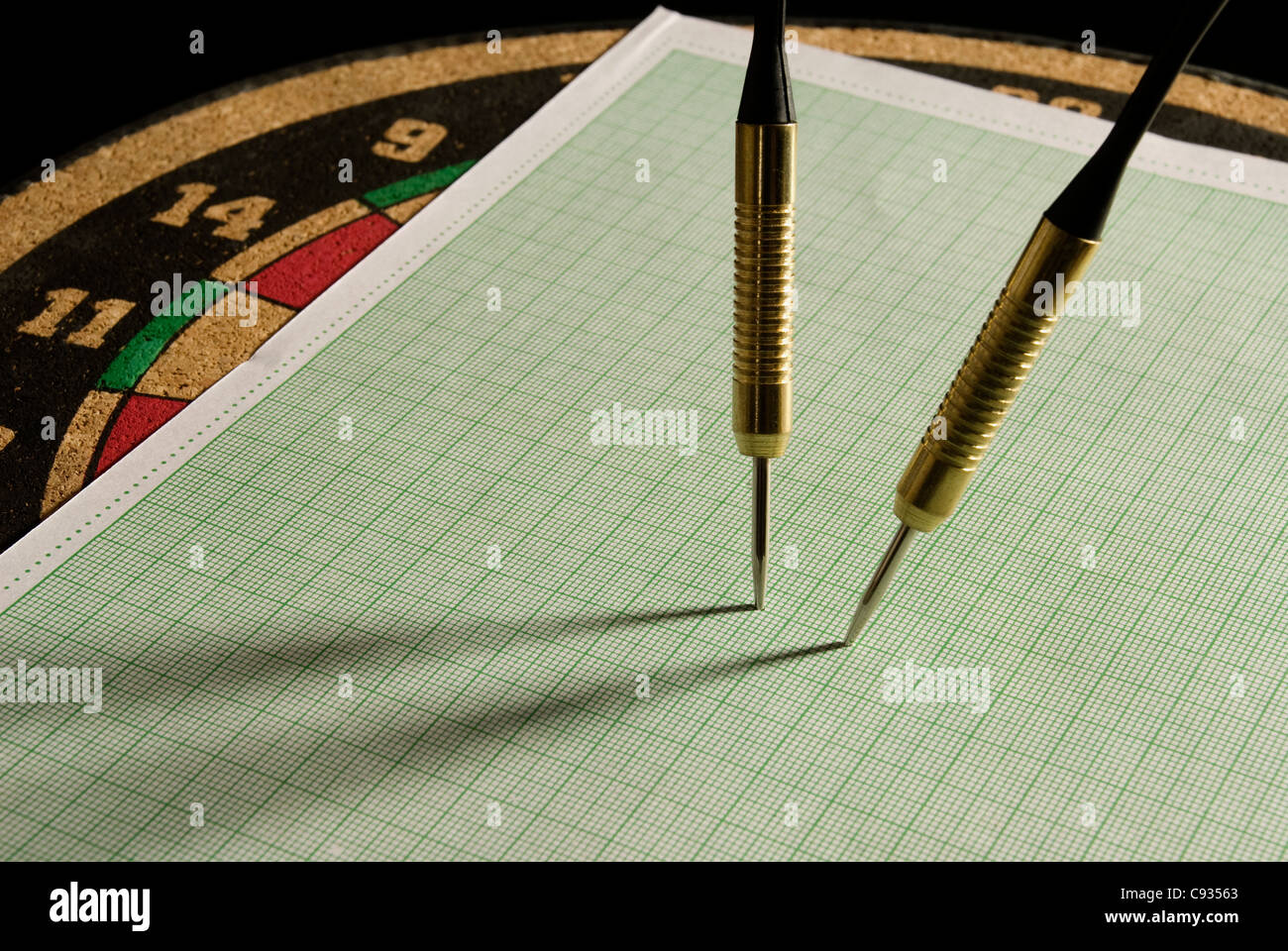 Darts on a Graph paper Stock Photo - Alamy