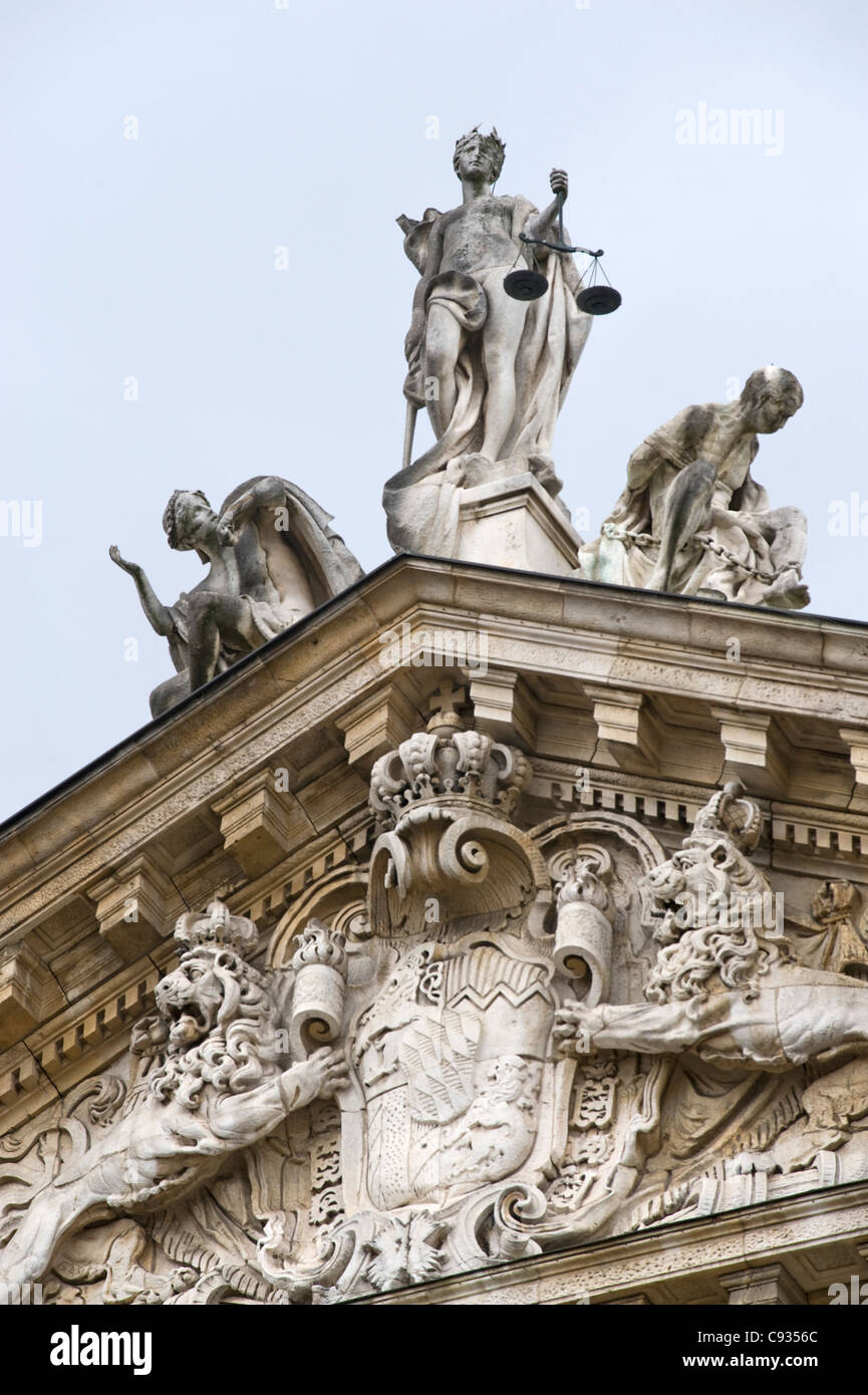 Germany, Bavaria, Munich. Statues on the roof of the Law Court Stock ...