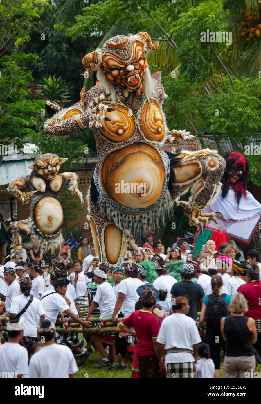 Bali, Ubud. Huge Ogoh-ogoh monsters are paraded through the streets of ...