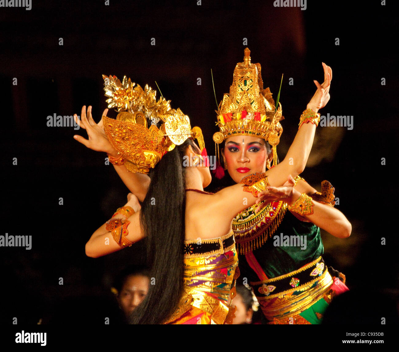 Bali, Ubud. Beautiful Balinese women dance a traditional Legong dance ...