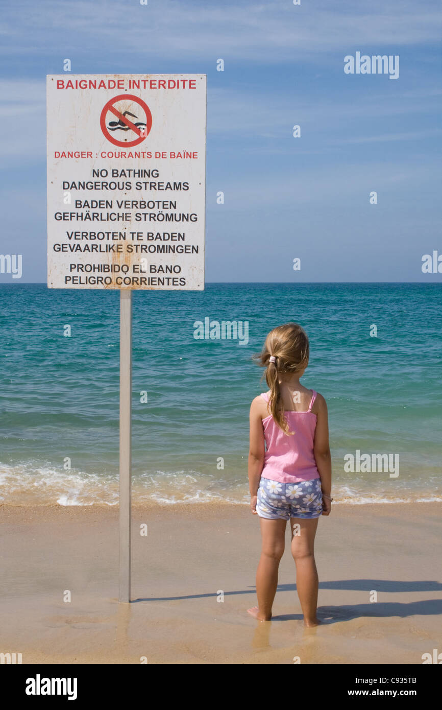 Looking at no swimming sign hi-res stock photography and images - Alamy