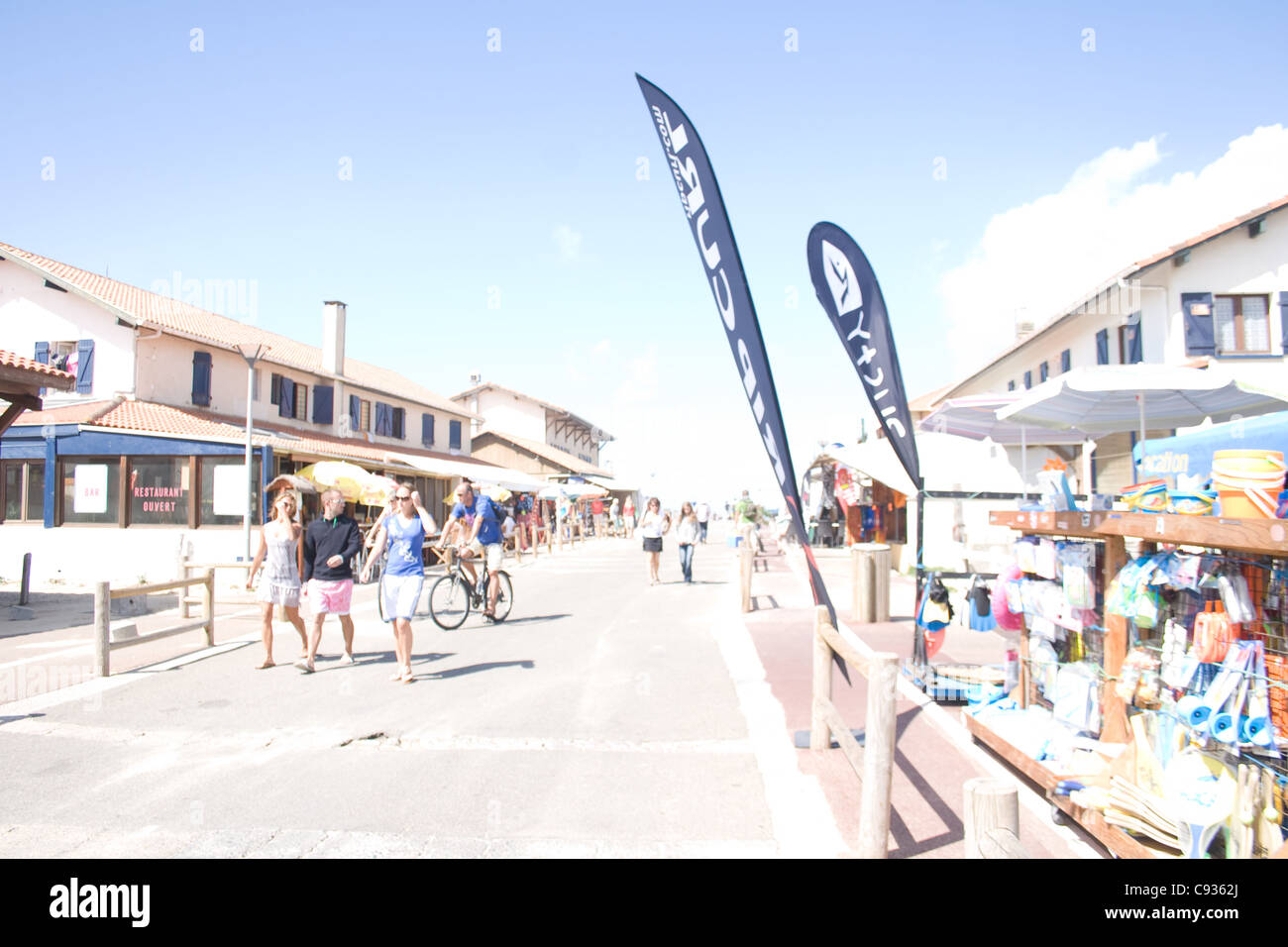 Visitors walking down the main street of St Girons Plage, South West ...