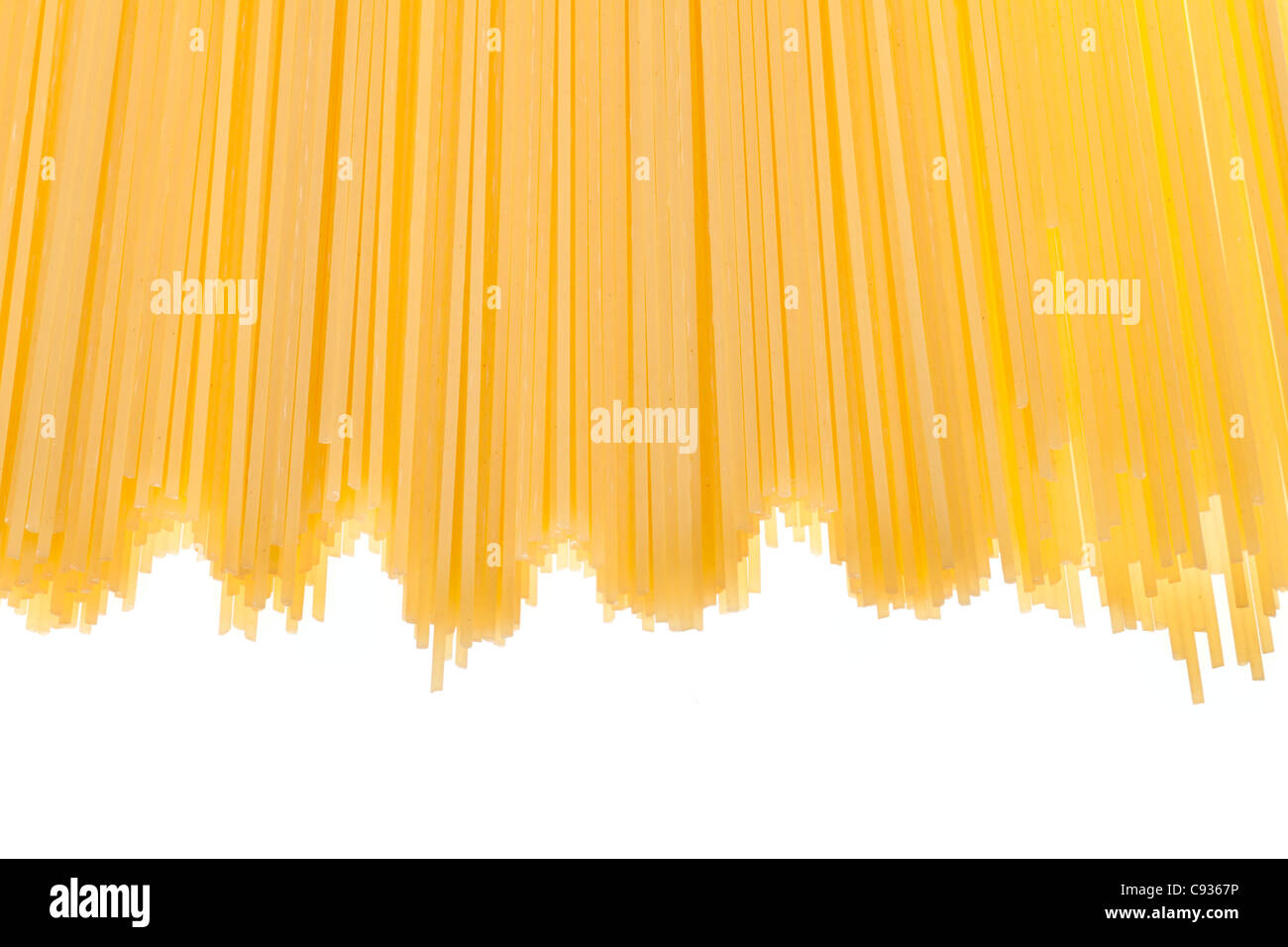 uncooked spaghetti, photo on the white background Stock Photo - Alamy