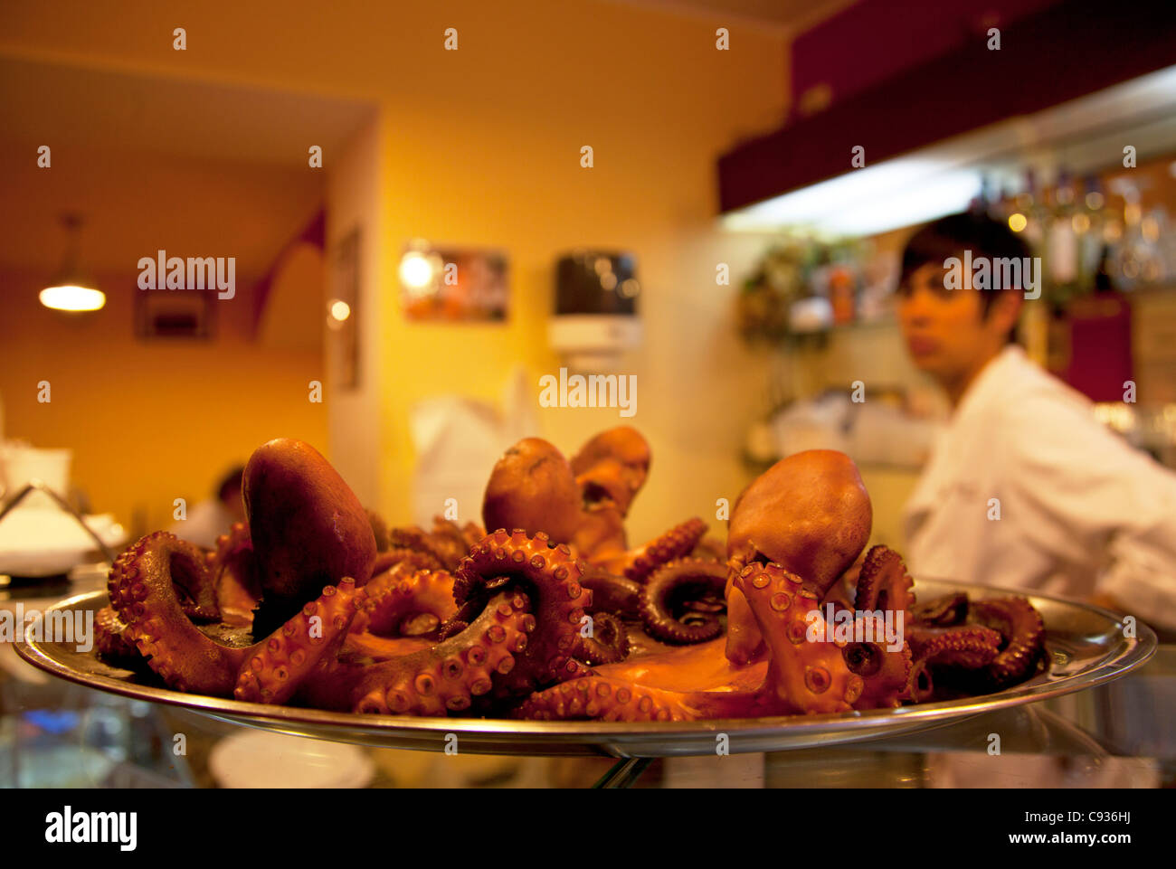 Sicily, Italy, Western Europe; Cooked octopus in a Sicilian restaurant ...
