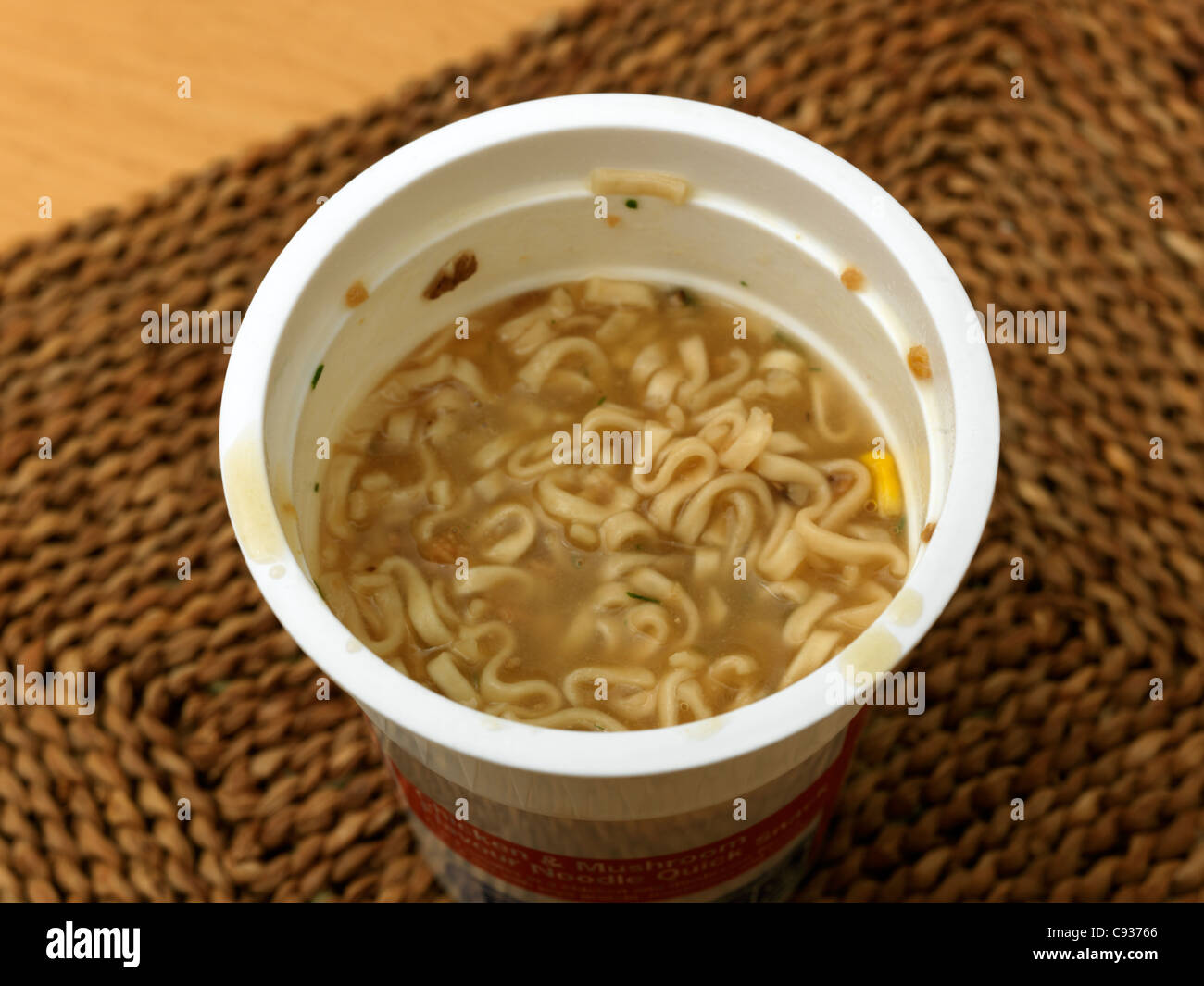 Chicken And Mushroom Instant Noodles In A Pot On A Place Mat Stock ...