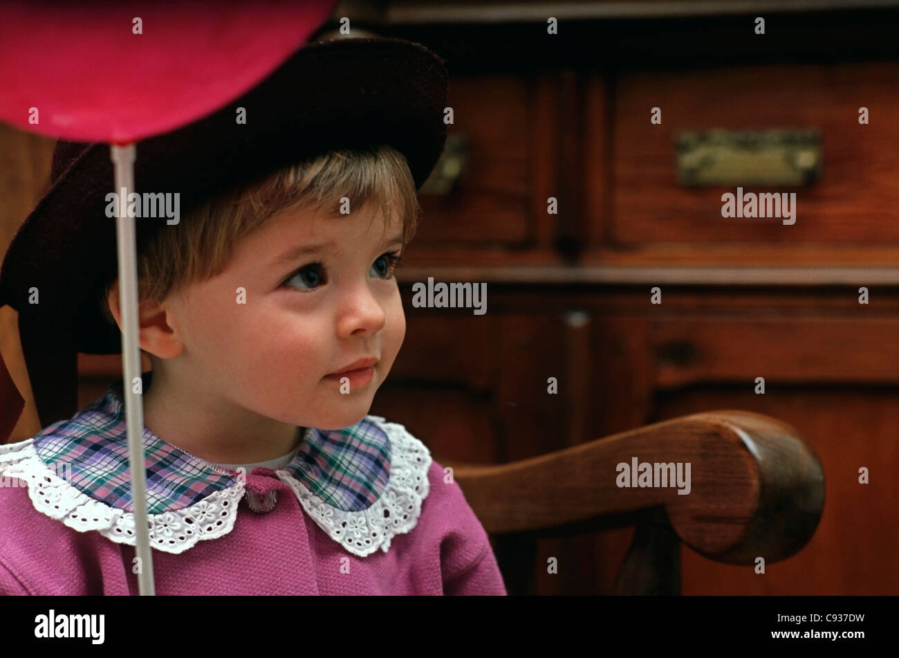 Cute attentive child girl Stock Photo - Alamy