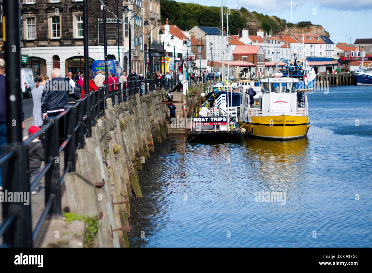 Whitby by the sea, with the boats at the docks and dockyard showing the ...