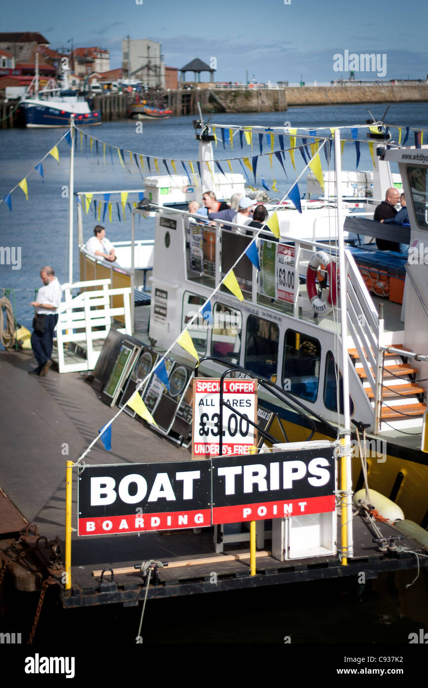 Whitby by the sea, with the boats at the docks and dockyard showing the ...