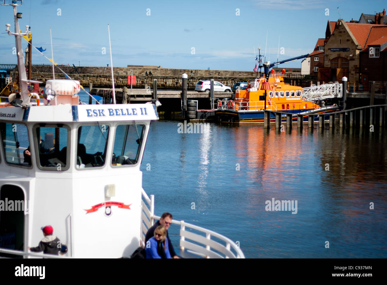 Whitby by the sea, with the boats at the docks and dockyard showing the ...