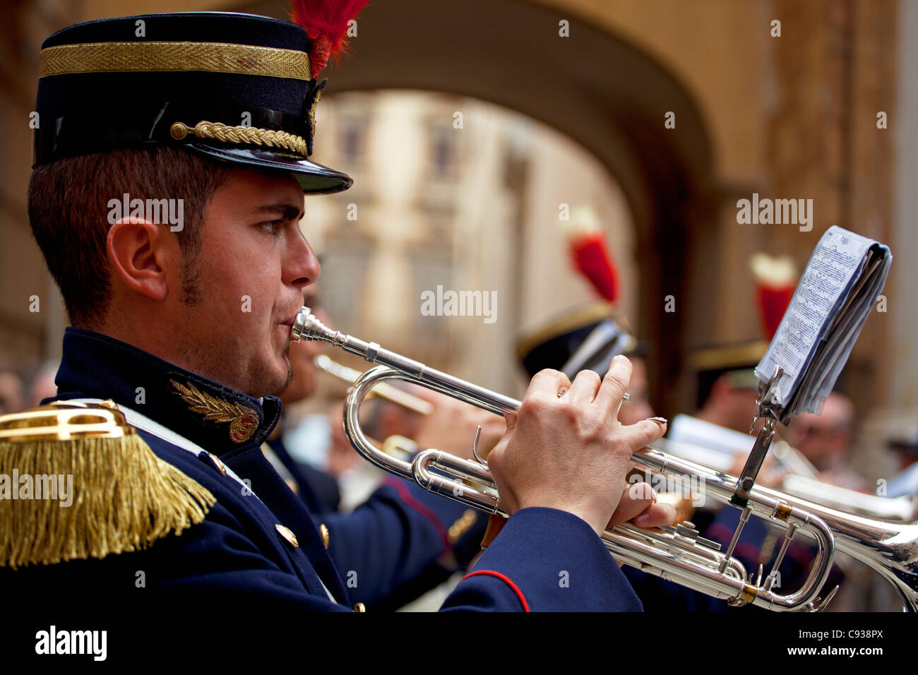 Sicily, Italy, Western Europe; A trumpeter, one of the band members ...
