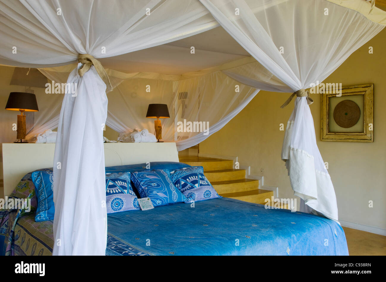 Malawi, Lake Malawi National Park. Luxurious bedroom of one of the ...