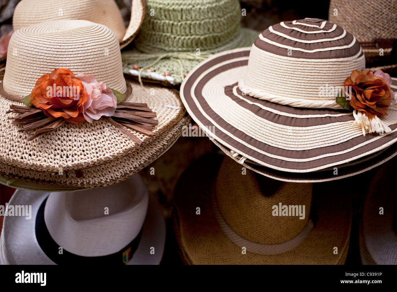 Sicily, Italy, Western Europe; Hats for sale at a souvenir's shop in ...