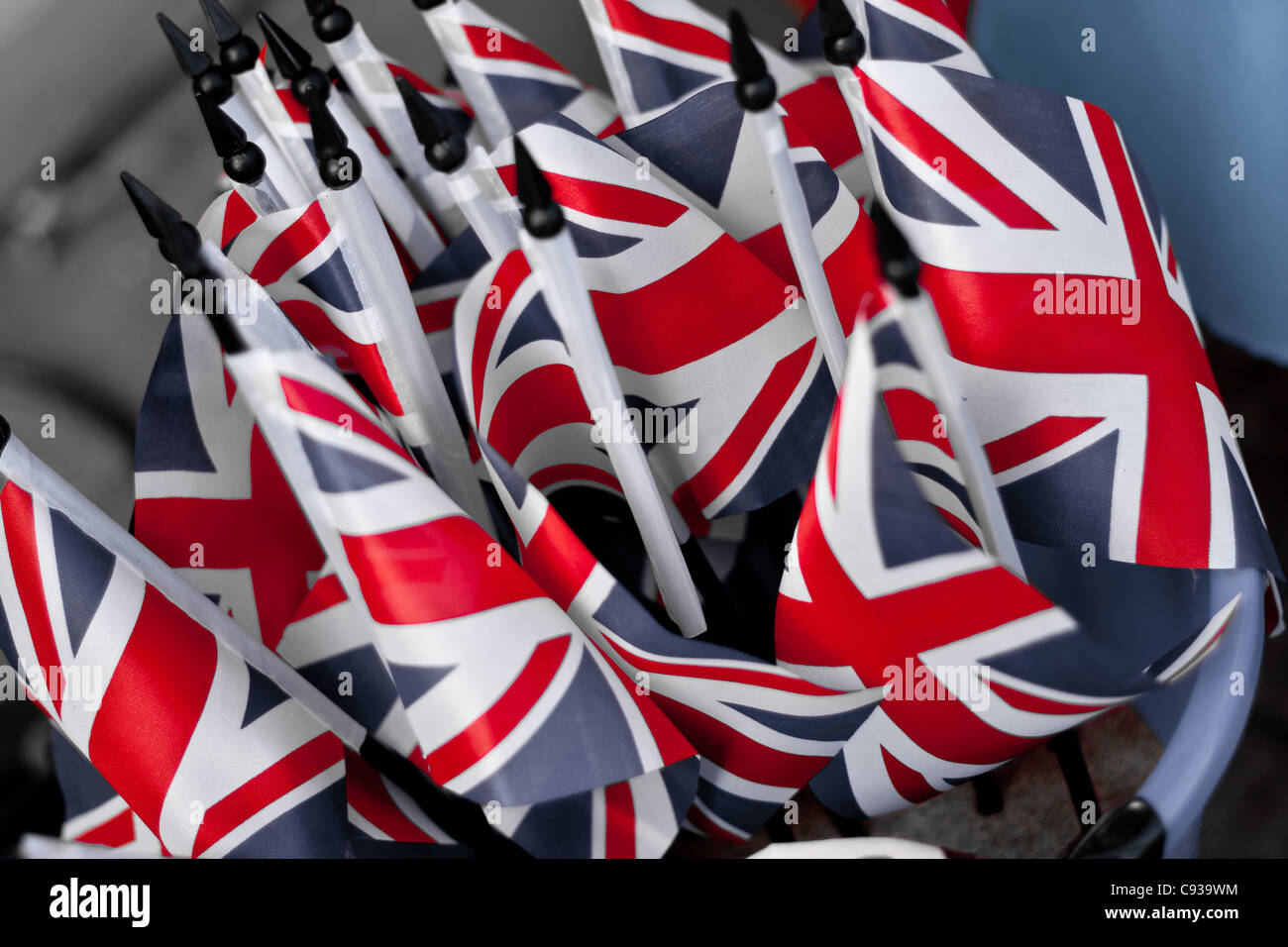 A collection of small beach English union jack flags displayed in a ...