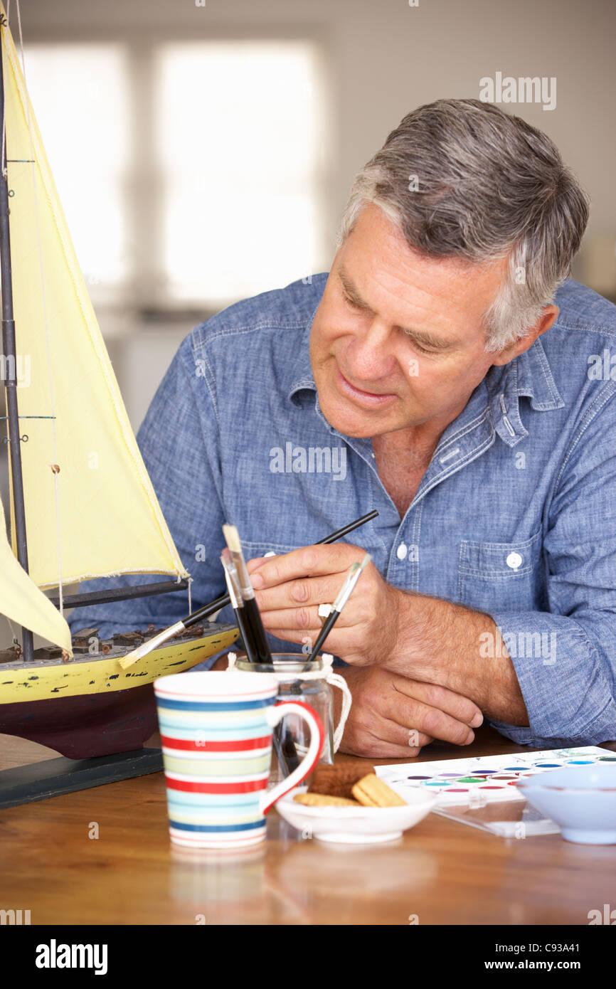 Senior man model making Stock Photo - Alamy